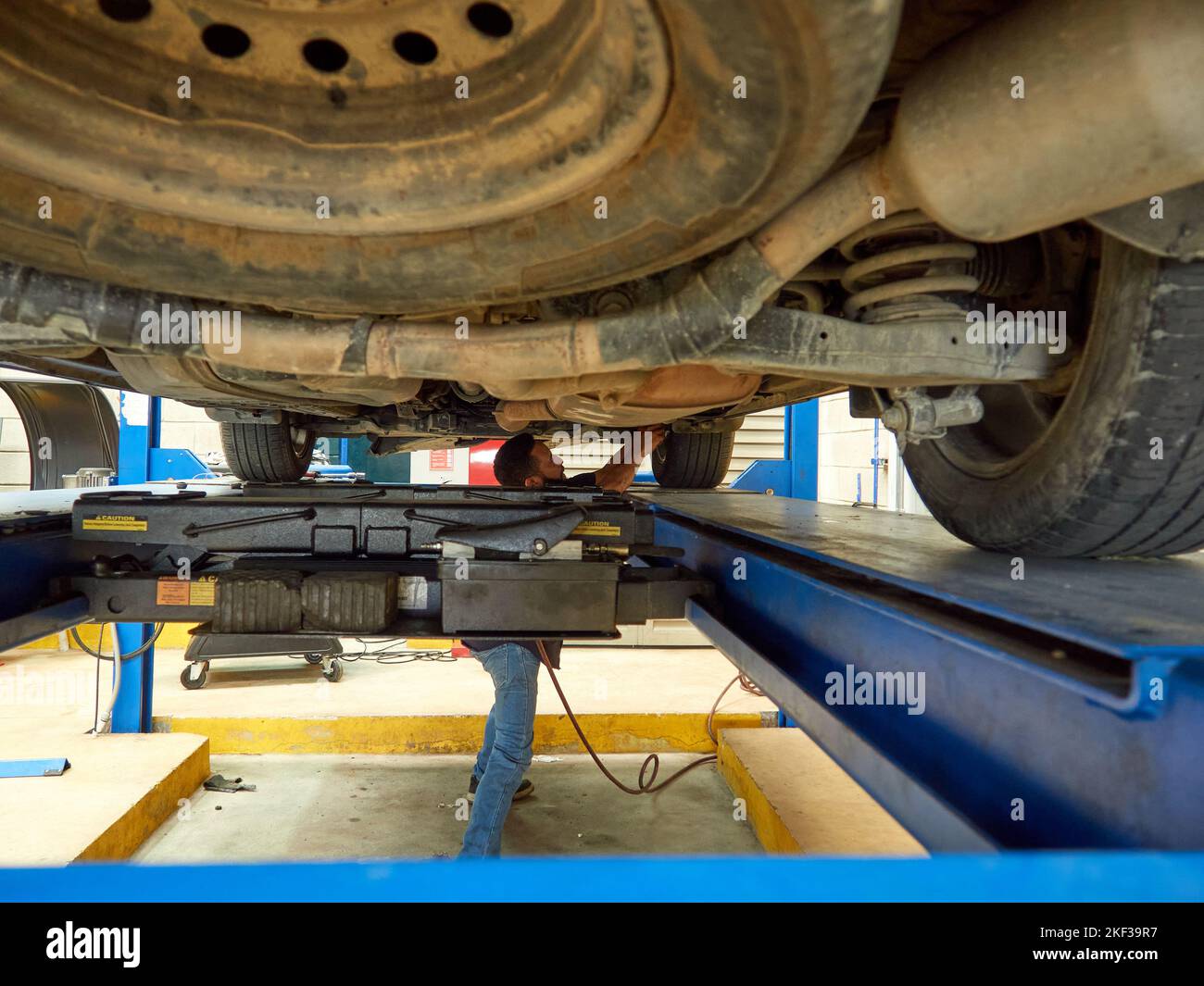 Professional mechanics workshop where automotive mechanics engineers ...
