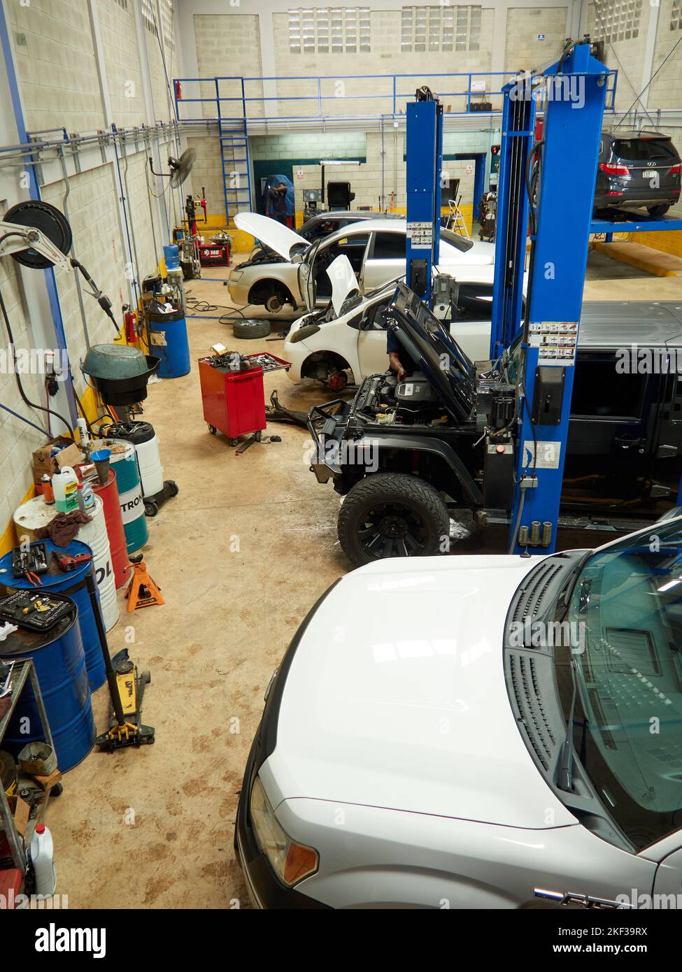 Professional mechanics workshop where automotive mechanics engineers ...