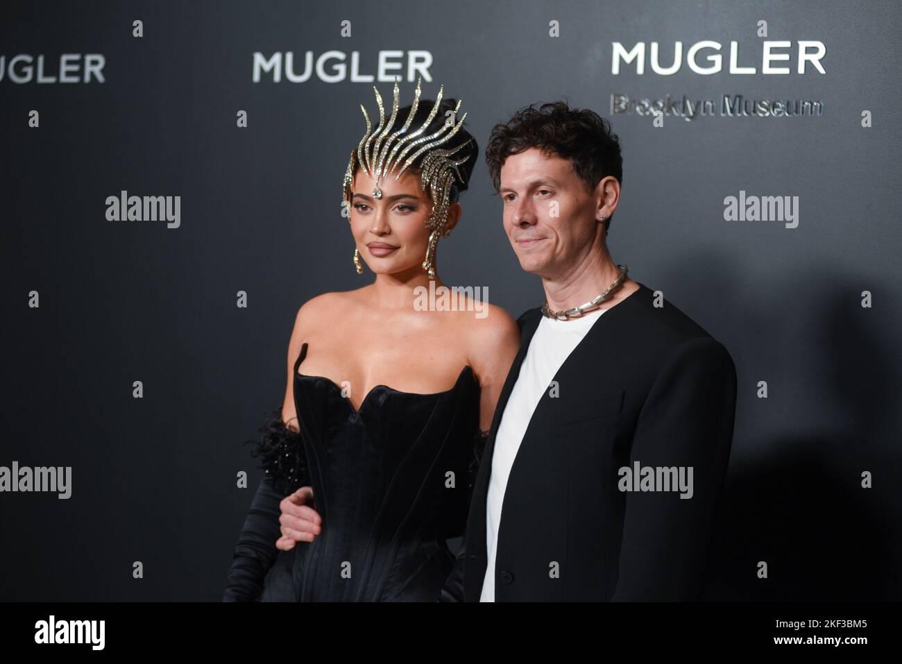 Kylie Jenner and Casey Cadwallader walking the red carpet at the Mugler Couturissime Exhibition ...
