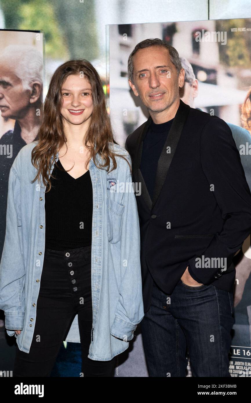 Olivia Jubin and Gad Elmaleh attend the Reste Un Peu premiere at UGC ...
