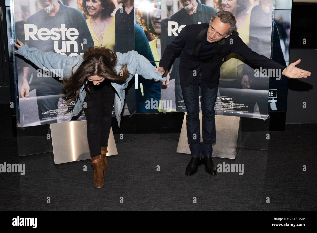 Olivia Jubin and Gad Elmaleh attend the Reste Un Peu premiere at UGC ...