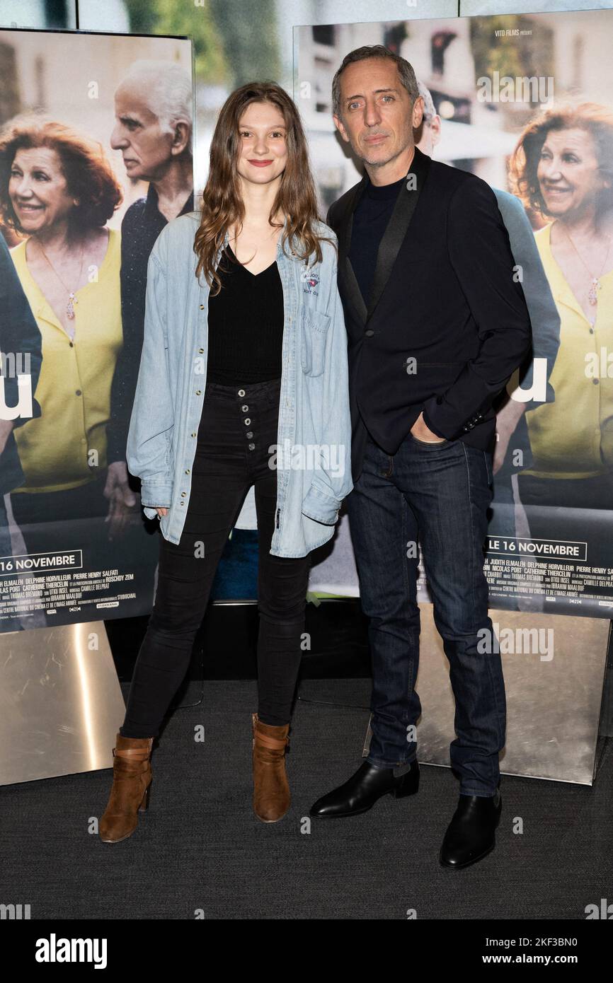 Olivia Jubin and Gad Elmaleh attend the Reste Un Peu premiere at UGC ...