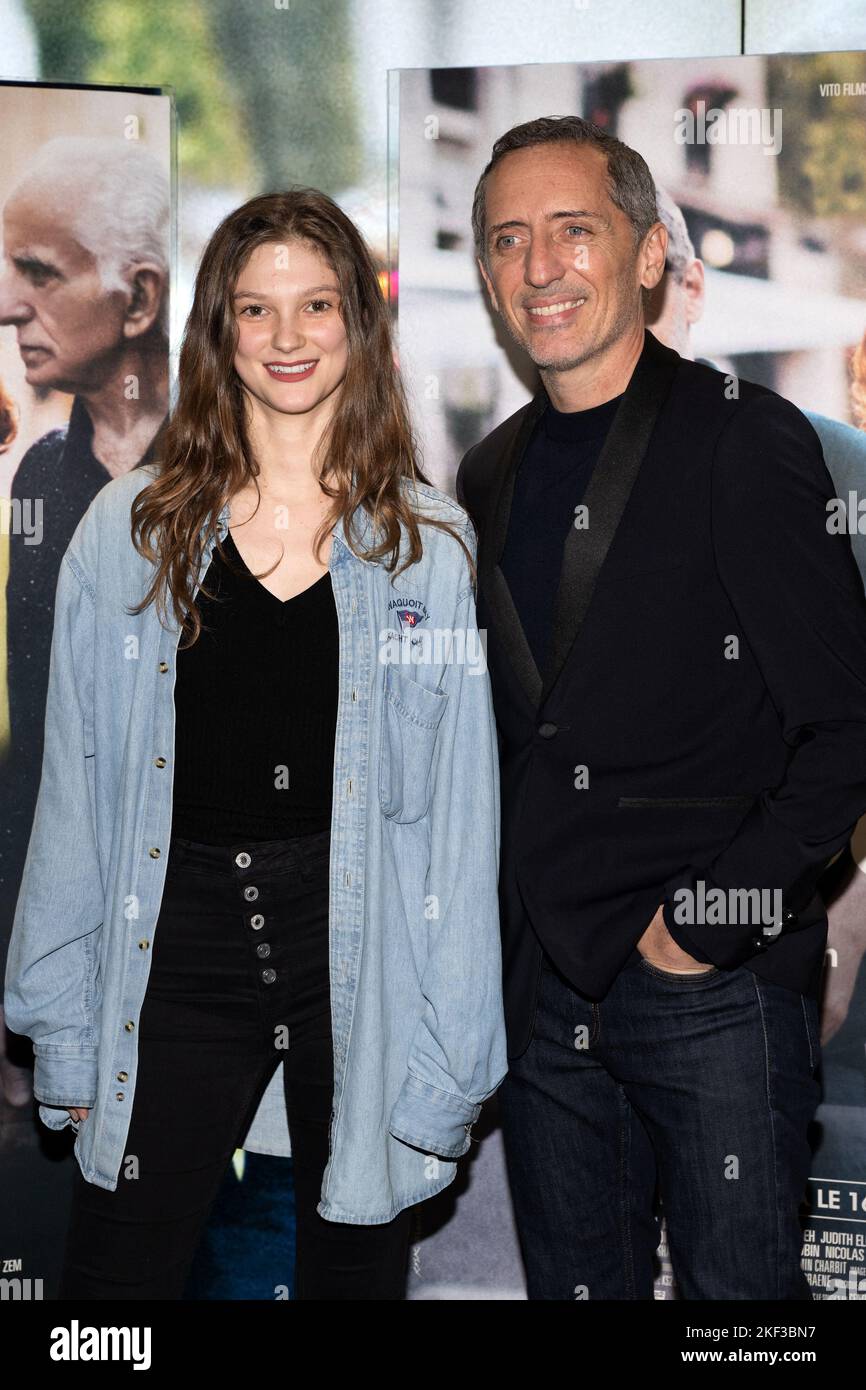 Olivia Jubin and Gad Elmaleh attend the Reste Un Peu premiere at UGC ...