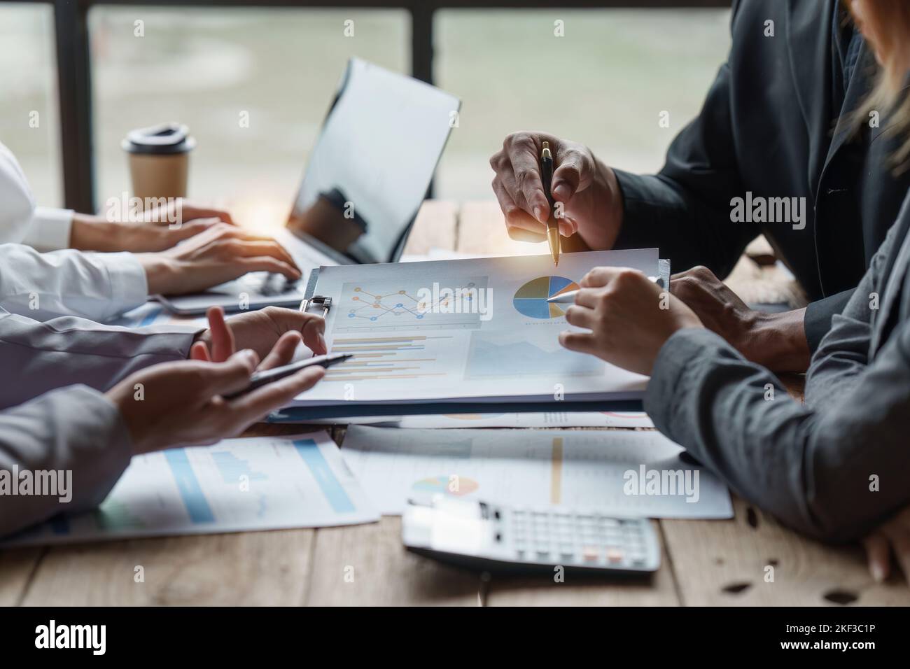 Group of Business people meeting to find marketing investment ...