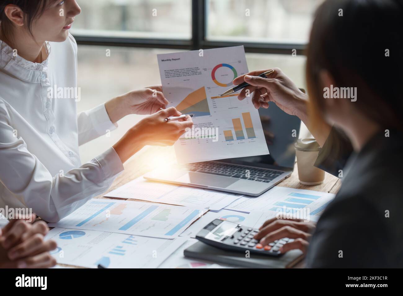 Group of Business people meeting for analysis data figures to plan business strategies. Business ...