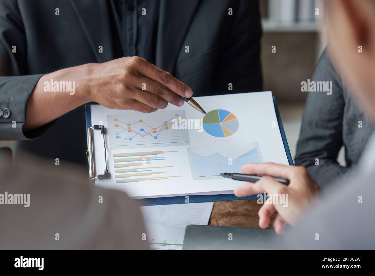 Group of Business people meeting for analysis data figures to plan ...