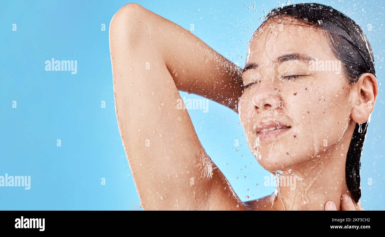 Woman, face and shower for skincare hydration, hygiene or beauty ...