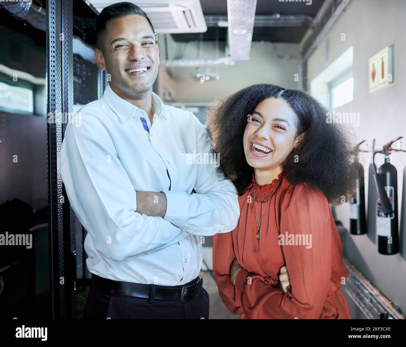 Engineer, cybersecurity and happy team together in a server room or data center for maintenance ...
