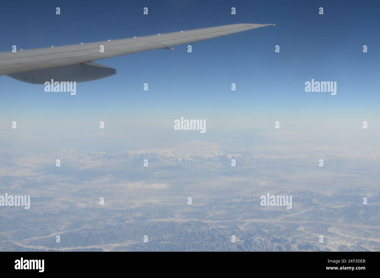 Airplane Vacation Sky Clouds Flight horizon blue Stock Photo - Alamy