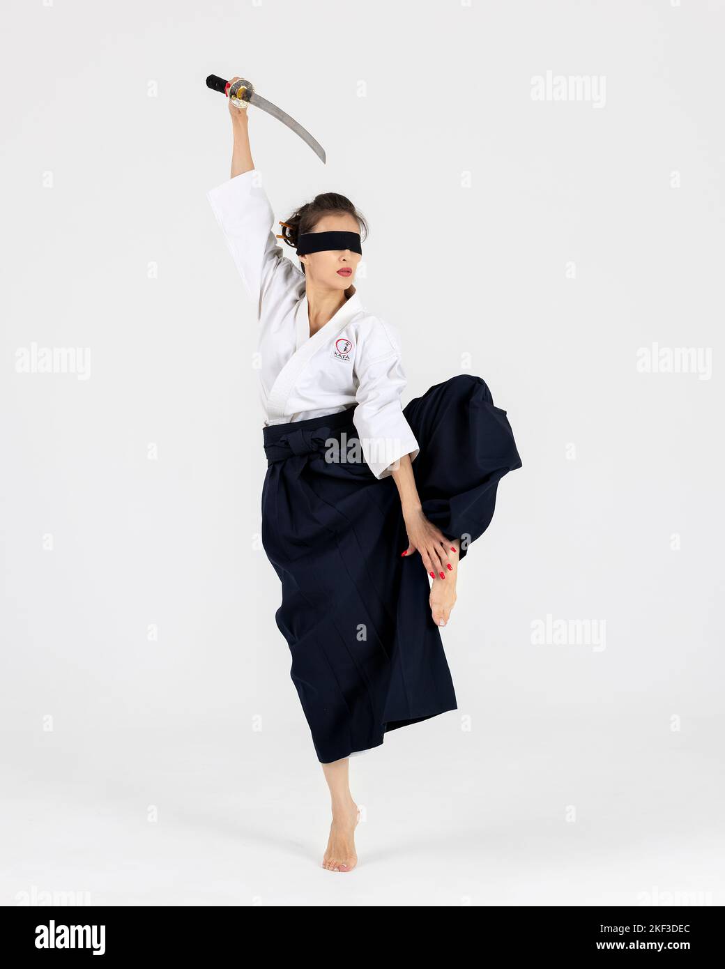 Aikido master woman in traditional samurai hakama kimono with black ...
