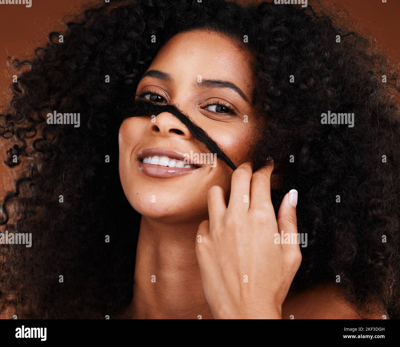 Black woman afro, hand and smile for hair cosmetics, care or treatment ...