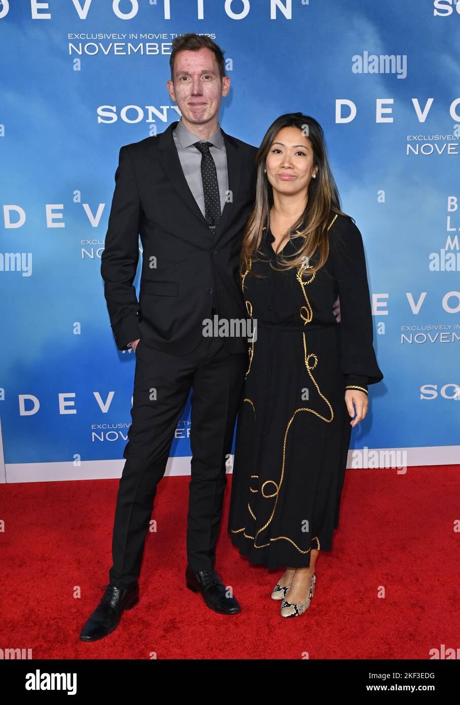 Los Angeles, USA. 15th Nov, 2022. Daniel Casey & Guest at the premiere for "Devotion" at the ...
