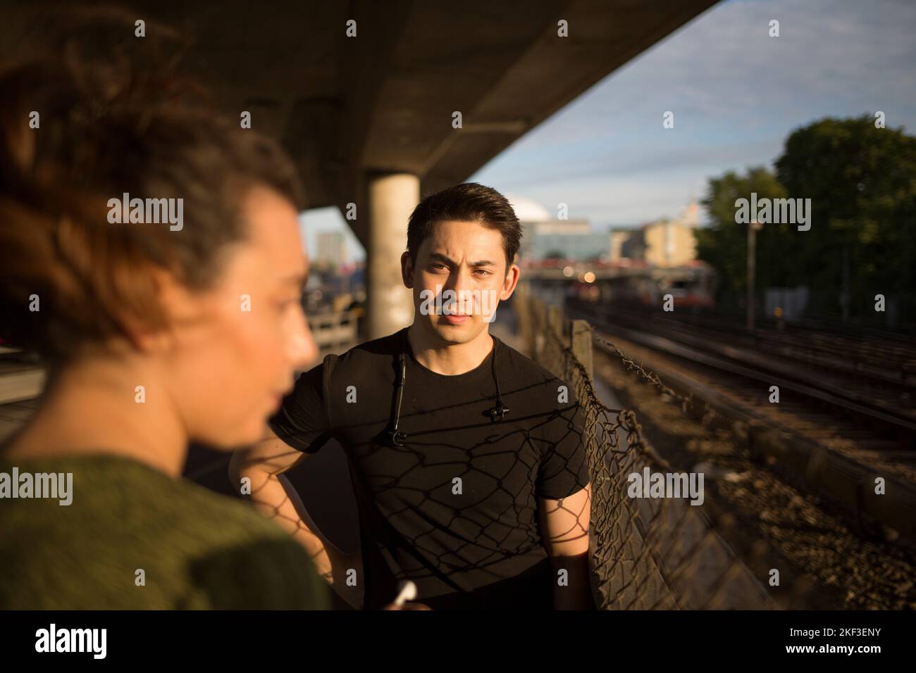 Woman under bridge hi-res stock photography and images - Alamy