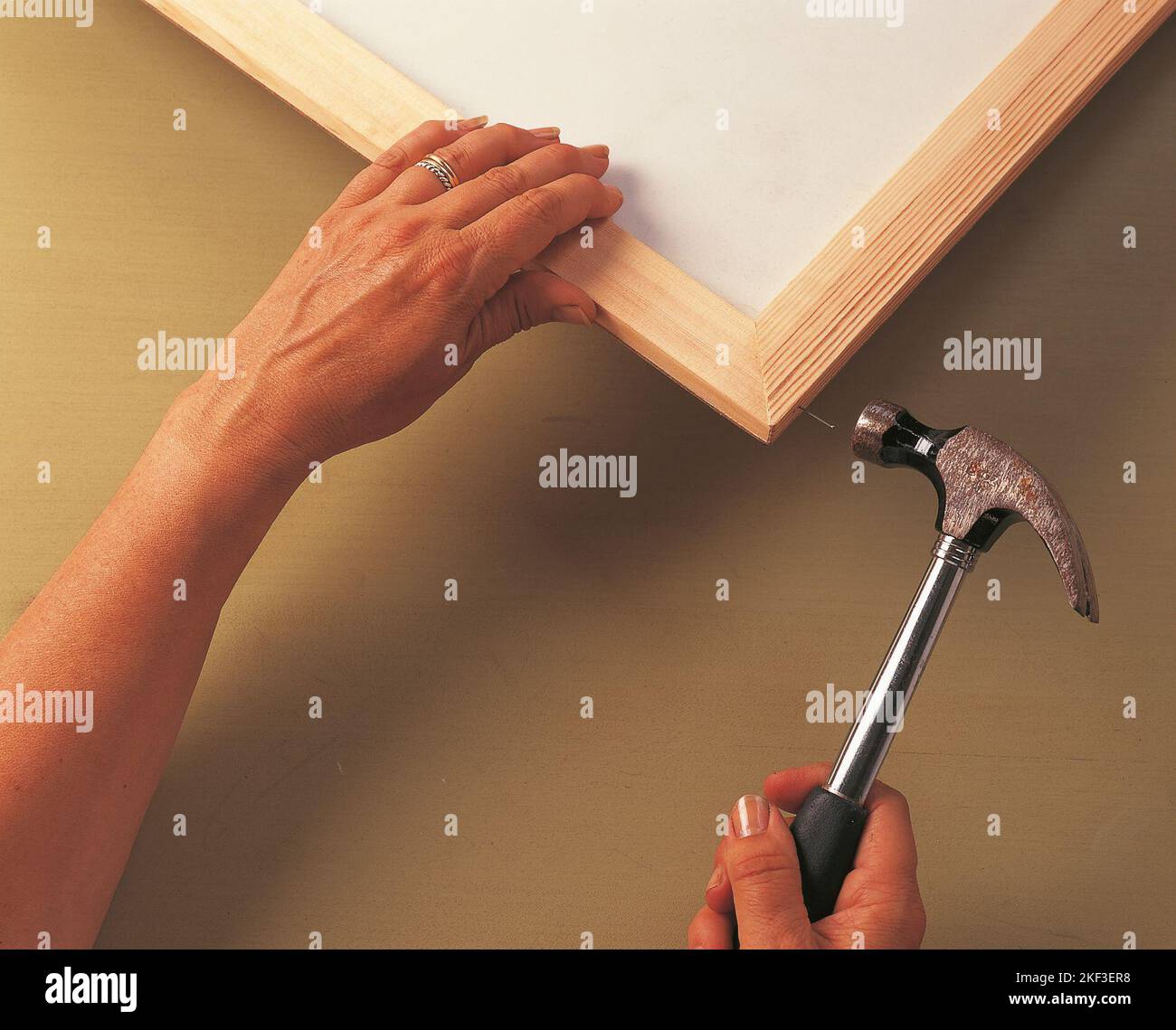 Mitering timber edgings Stock Photo - Alamy