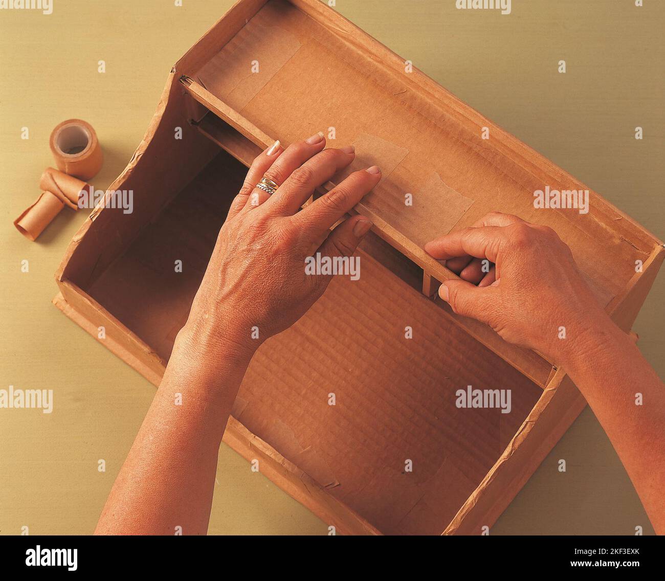 Fitting the shelf Stock Photo - Alamy