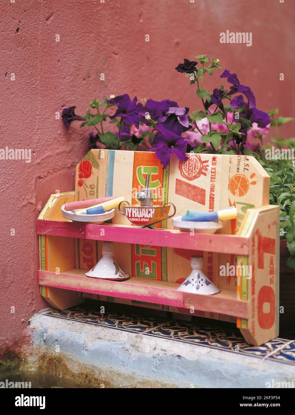 A colourful wooden shelf unit Stock Photo - Alamy