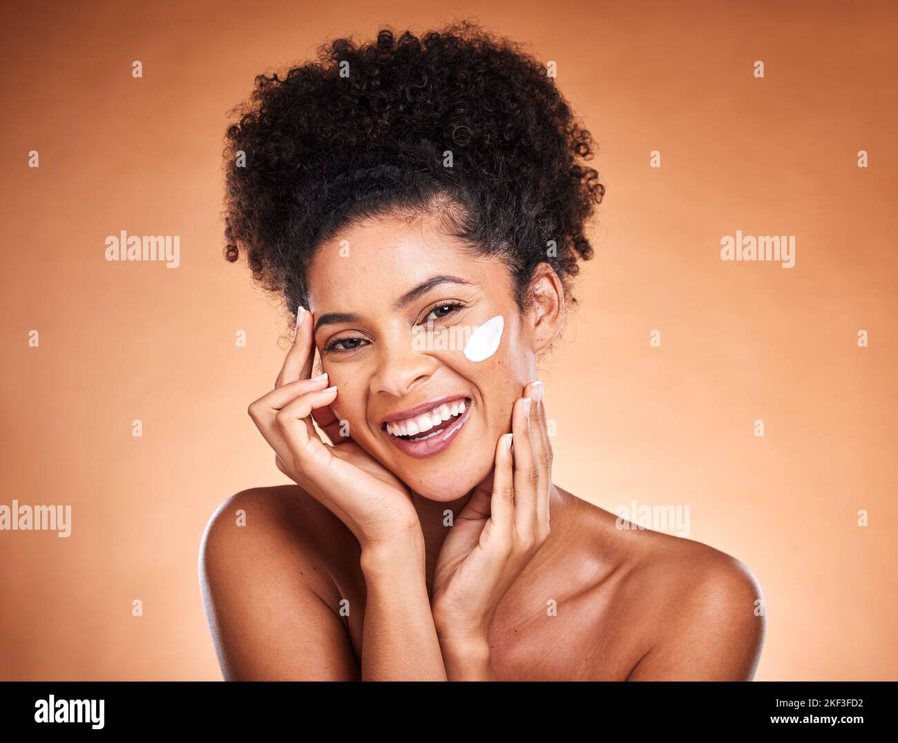 Skincare, face and cream of black woman in studio for cosmetics, beauty and healthy glow with ...