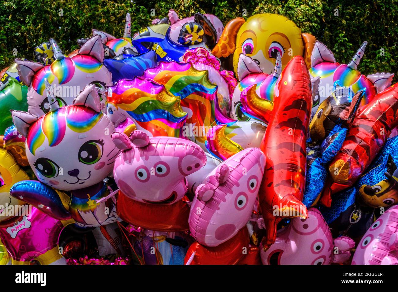 Detail of bunch of colourful Helium Cartoon Characters Balloons ...