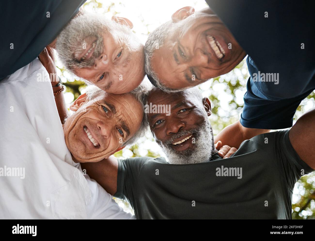 Old men, huddle and diversity, friends and teamwork outdoors for ...