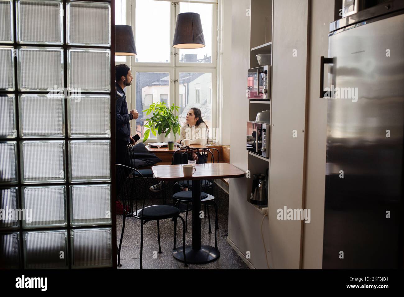 Business people in break room hi-res stock photography and images - Alamy