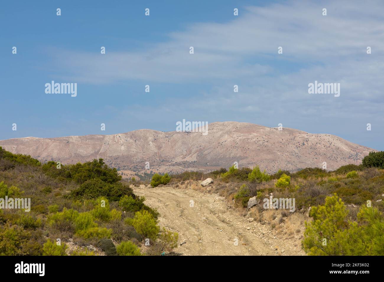 Sandy country road, 4x4 off-road trail to the peak of Attavyros ...