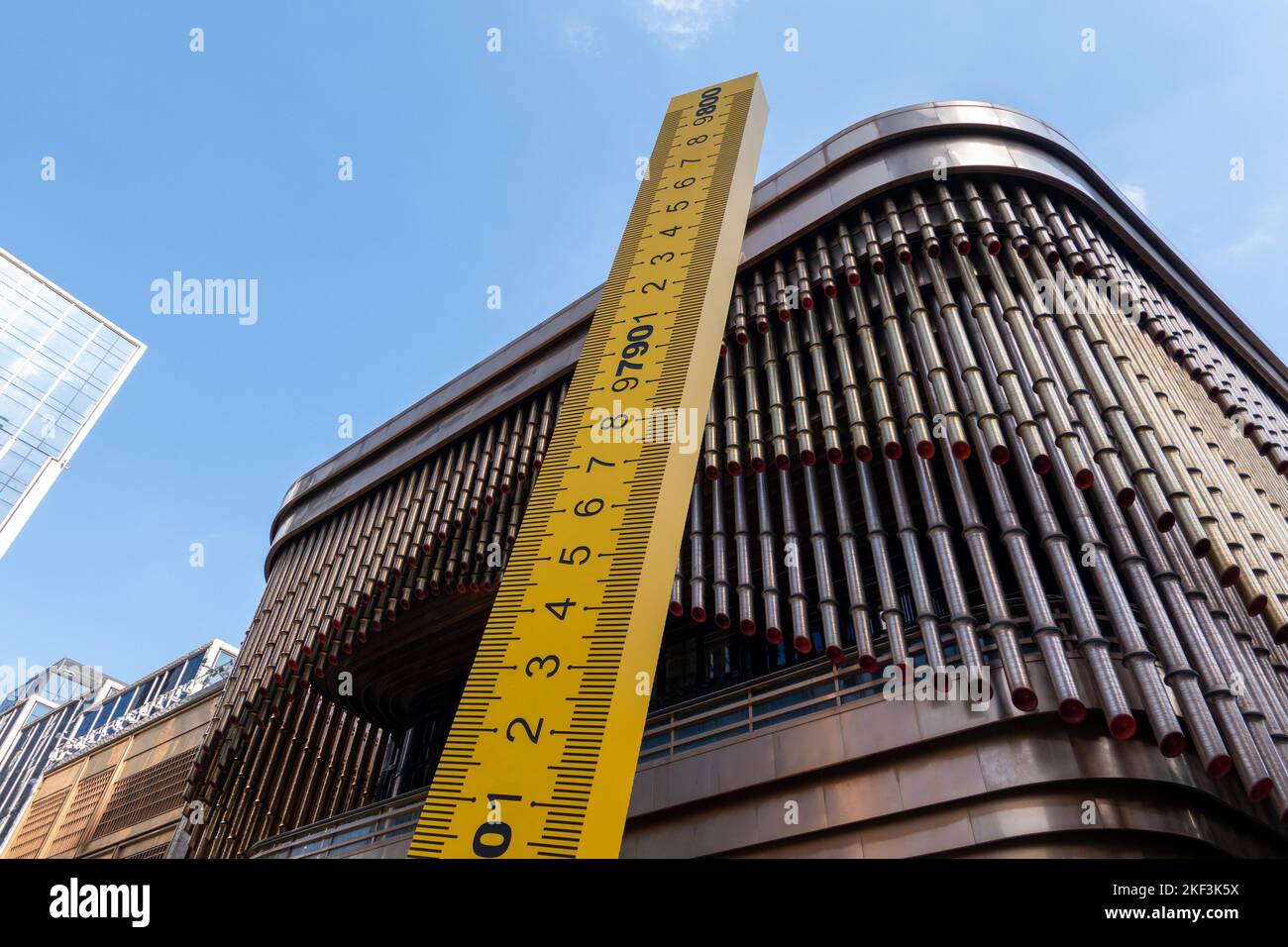 A yellow ruler about three meters high appeared on the square of the ...