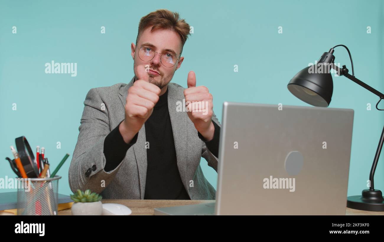 Great job. Nice. Happy bearded business man sitting at office desk ...