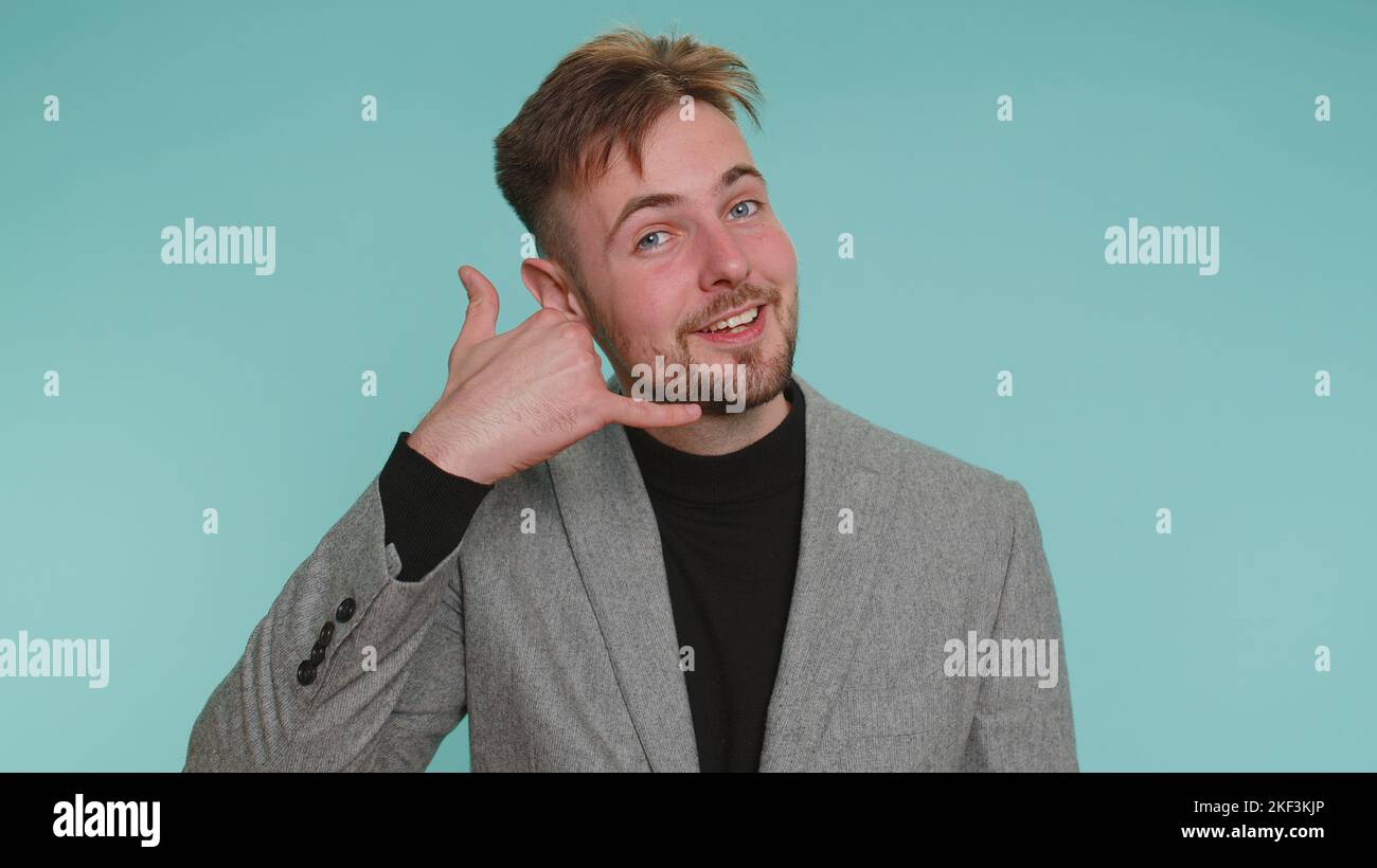 Call me, here is contact number. Cheerful one business man in jacket ...