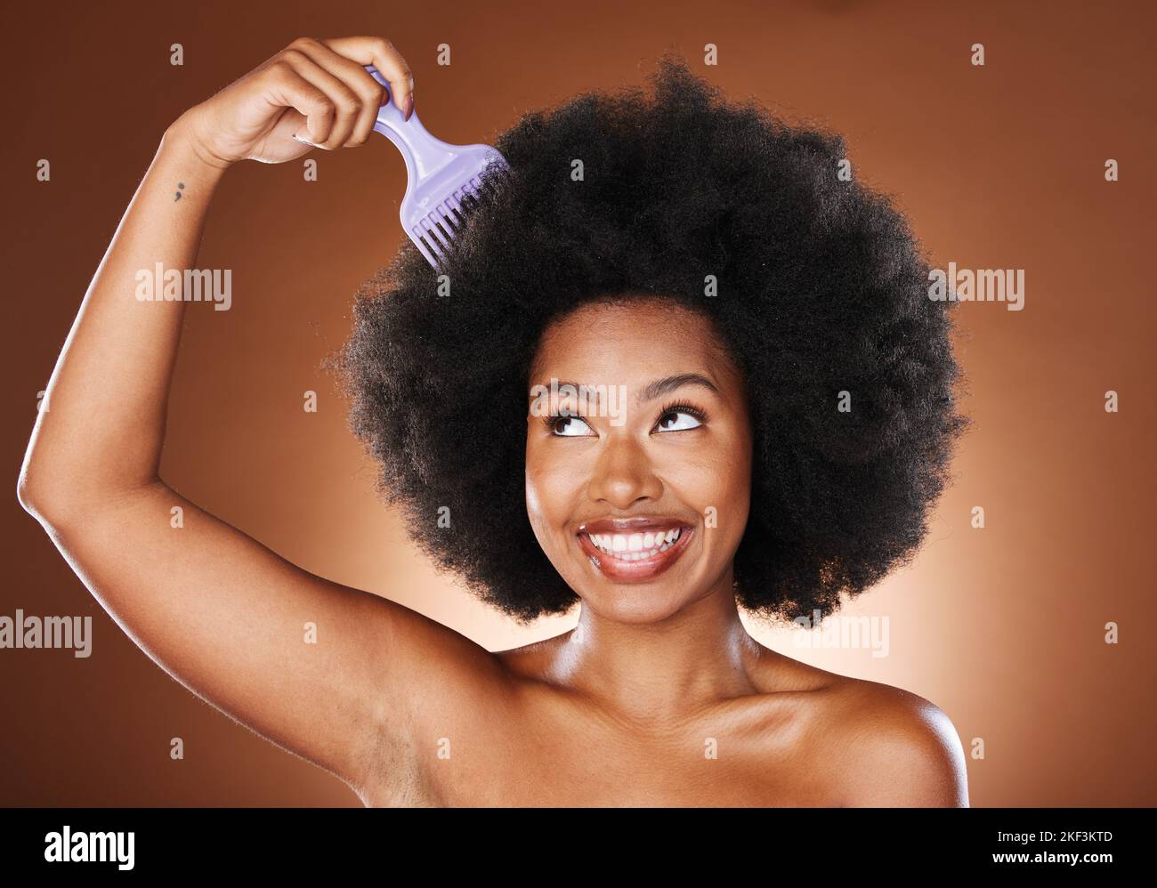 Beauty, hair care and black woman with afro comb in studio isolated on ...