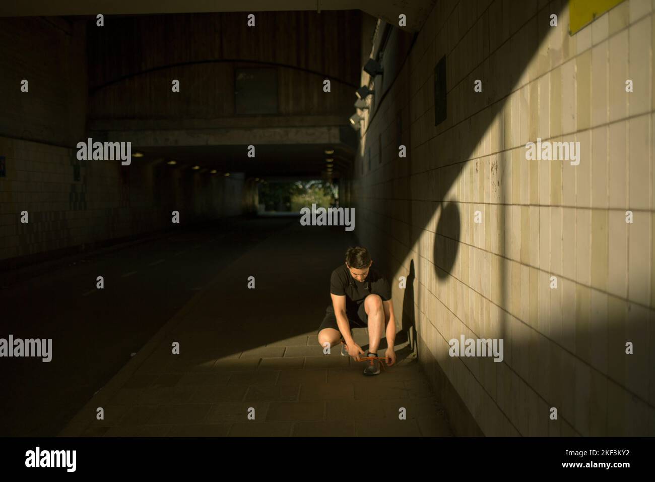 With crouching shadow hi-res stock photography and images - Alamy