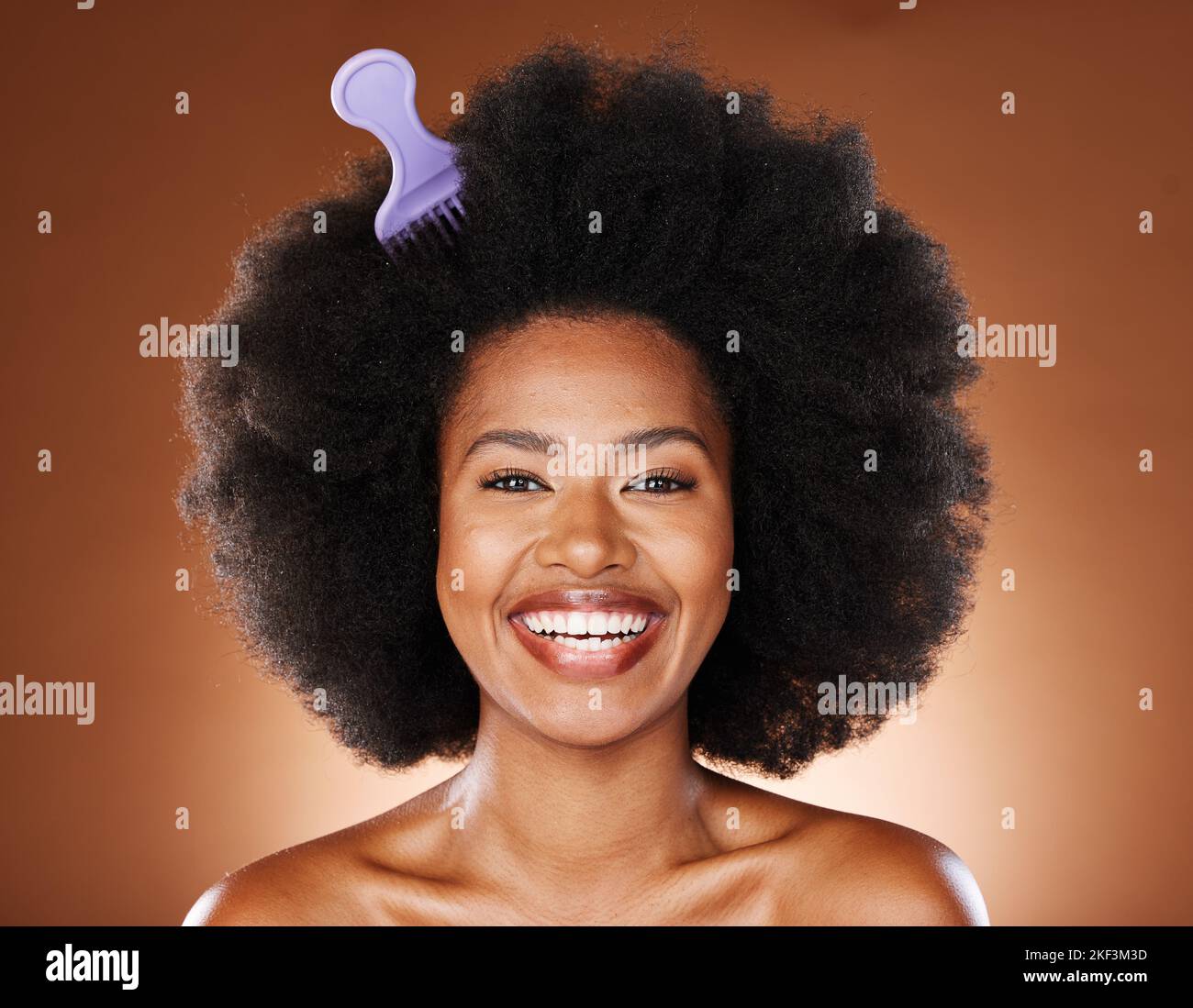 Black woman. hair care and comb in afro, happy face and skincare with ...
