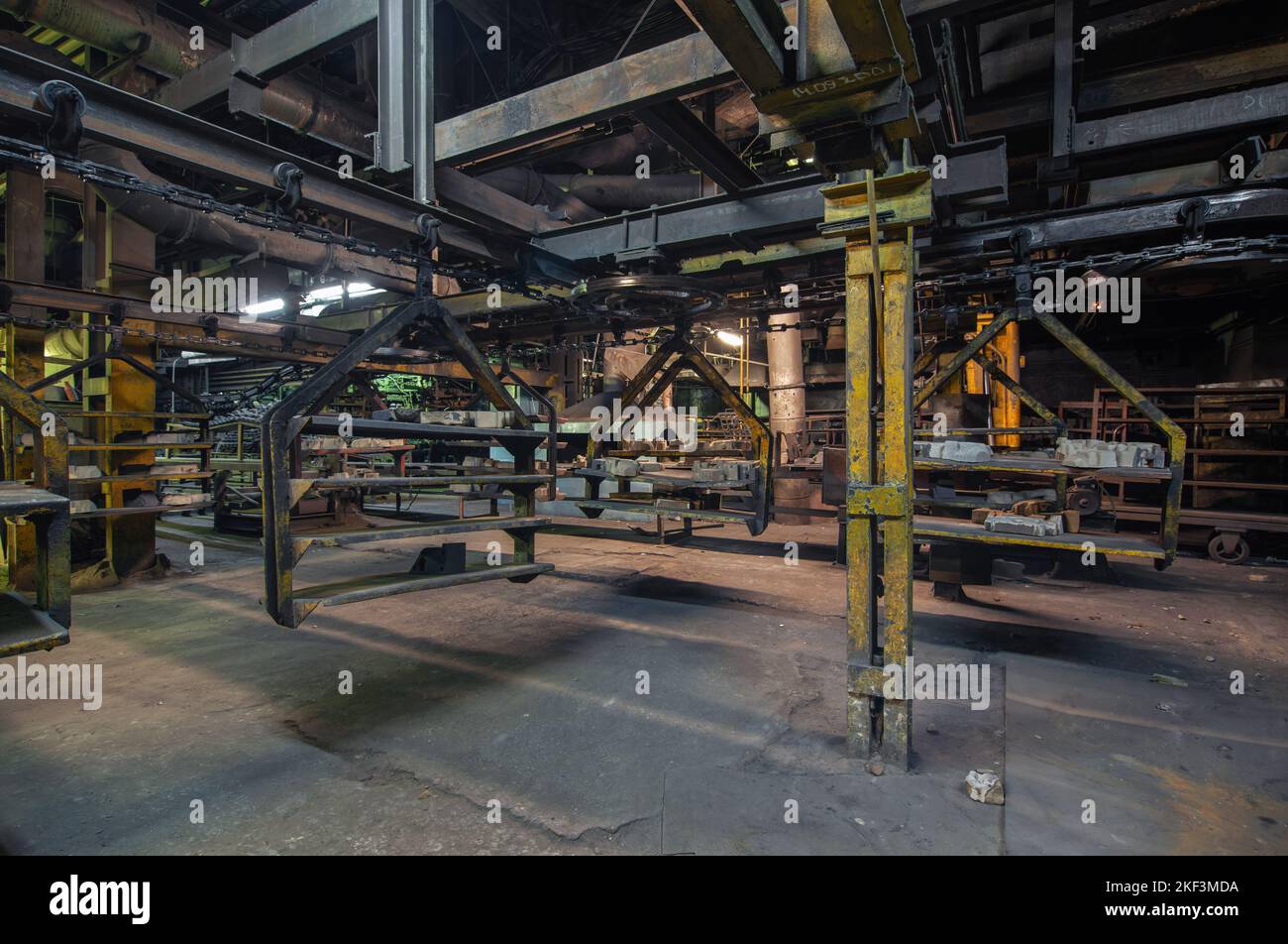 Overhead conveyor in an old car parts factory Stock Photo - Alamy
