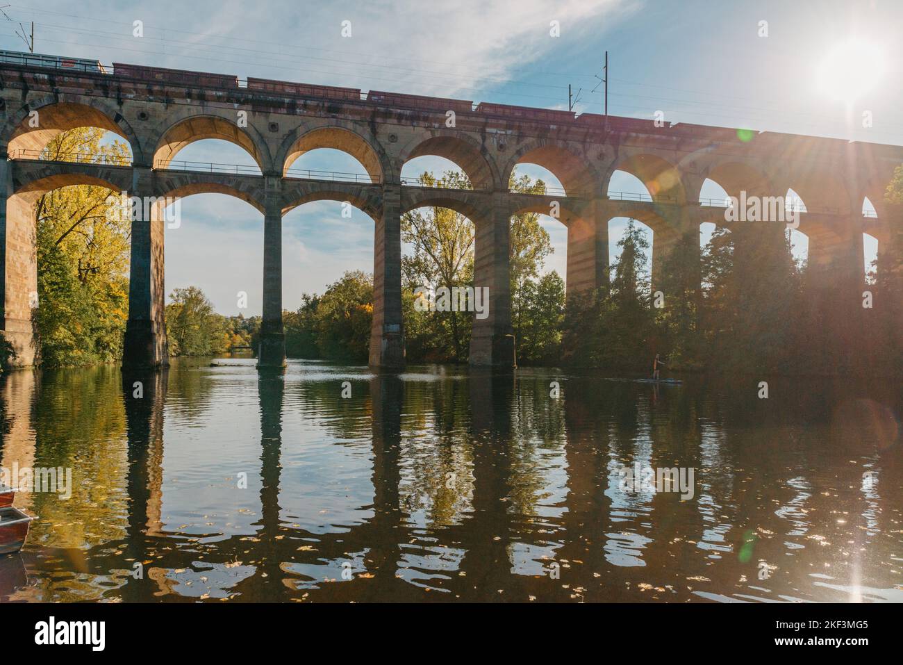 Germany train passing train bridge on cloudy day in germany hi-res ...