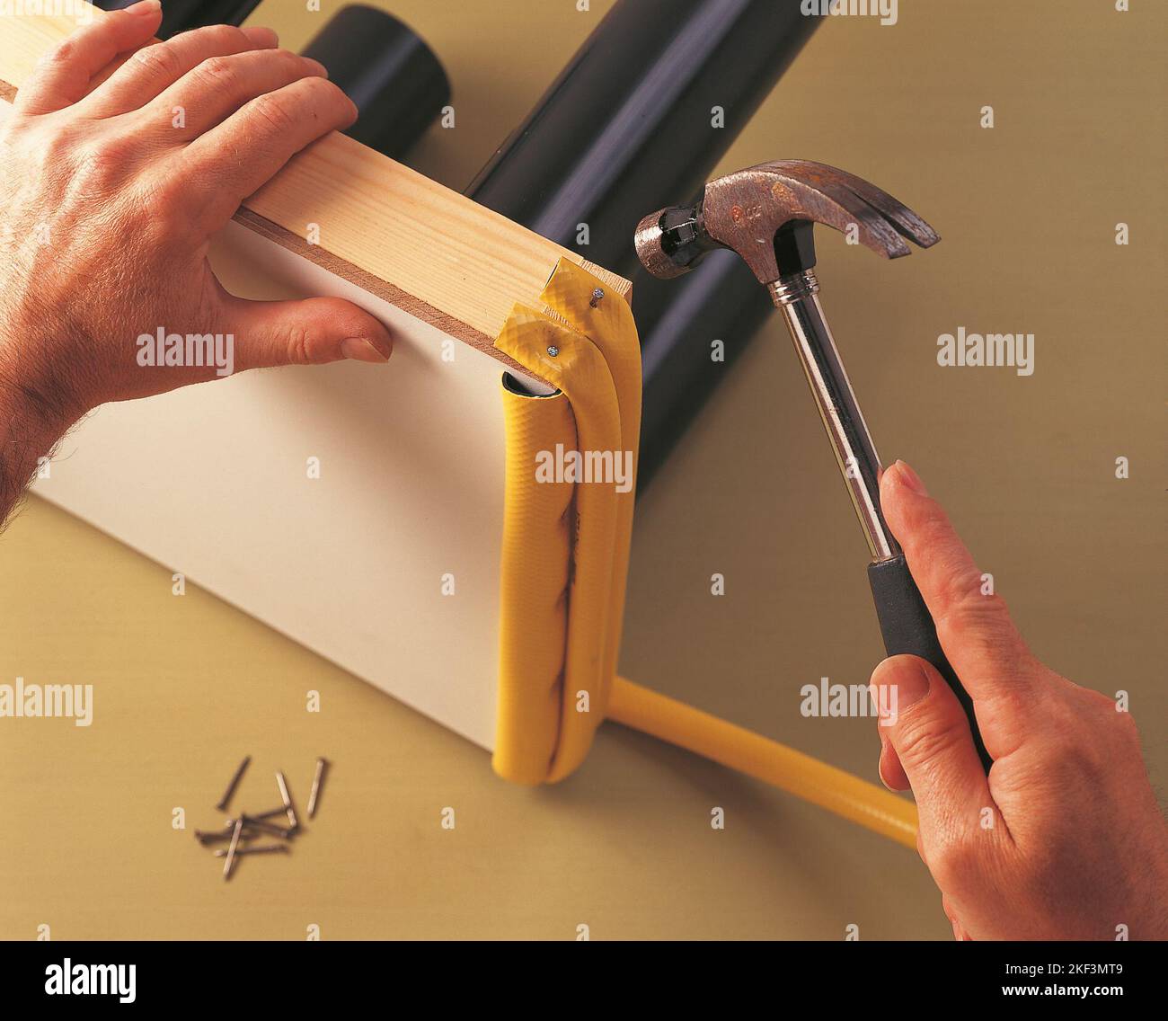 Nailing hands hi-res stock photography and images - Alamy