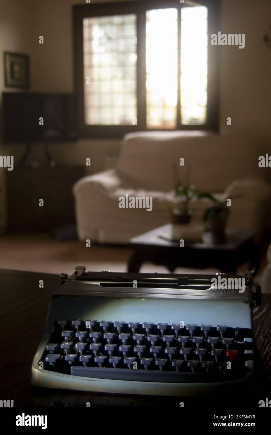 old typewriter with window background Stock Photo - Alamy