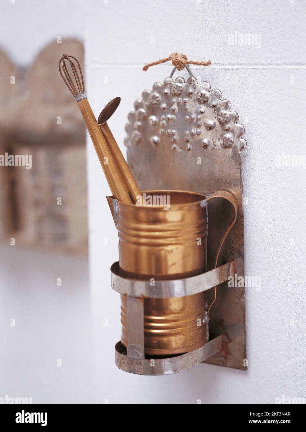 A recycled tin can holder Stock Photo - Alamy