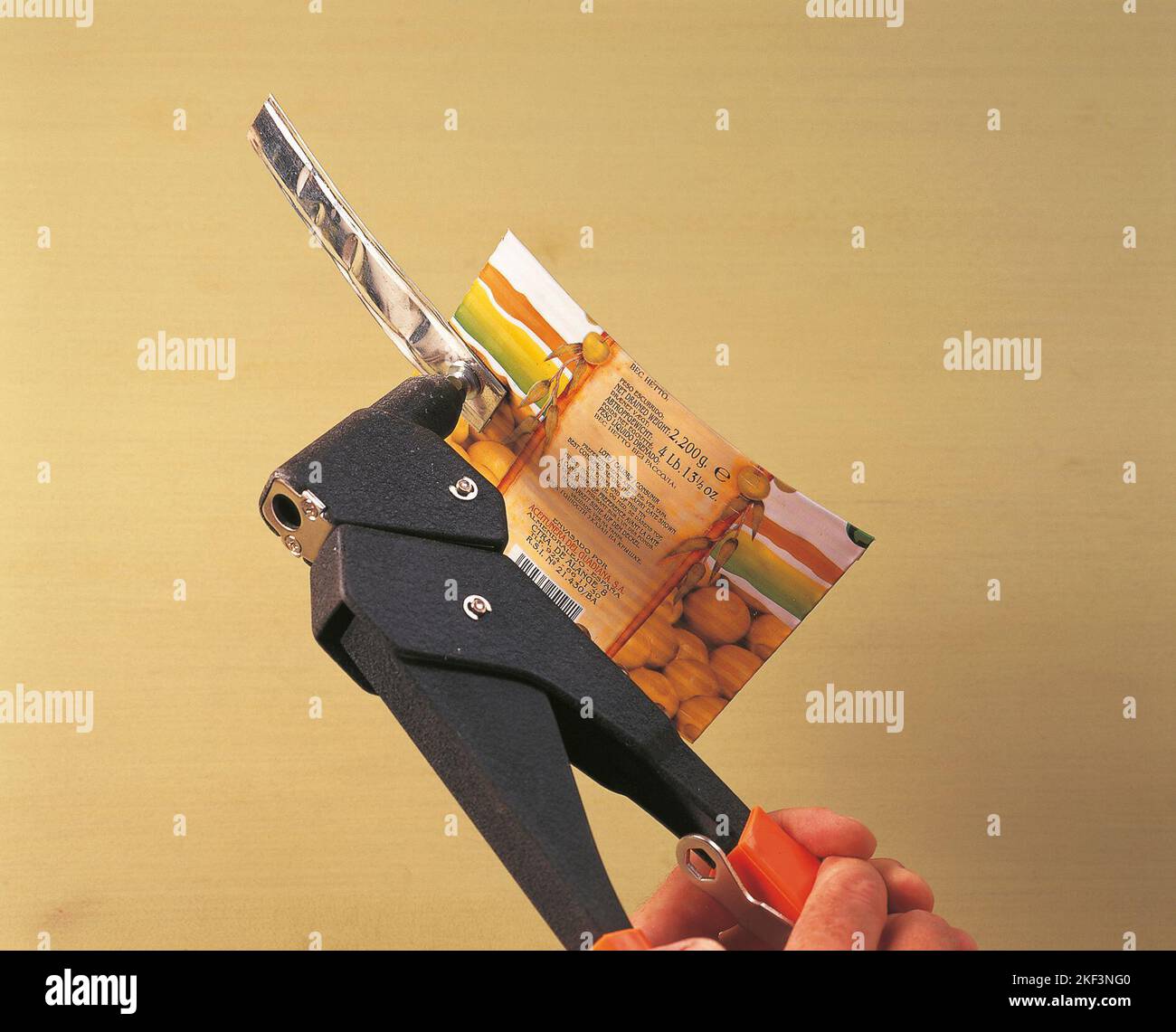 Positioning a rivet in the hole Stock Photo - Alamy