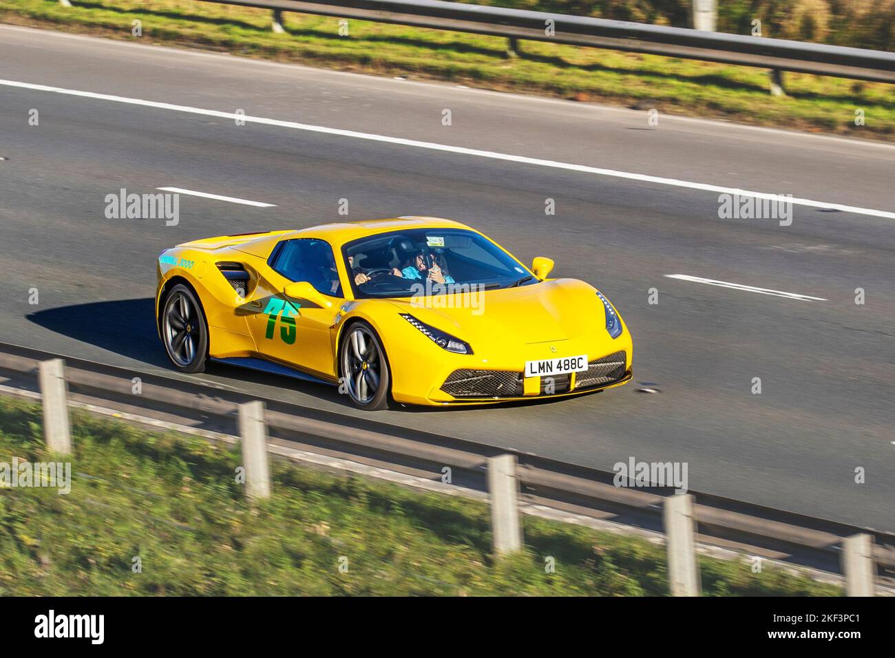 Yellow 488 FERRARI SPIDER 7-speed automatic; travelling on the M6 ...