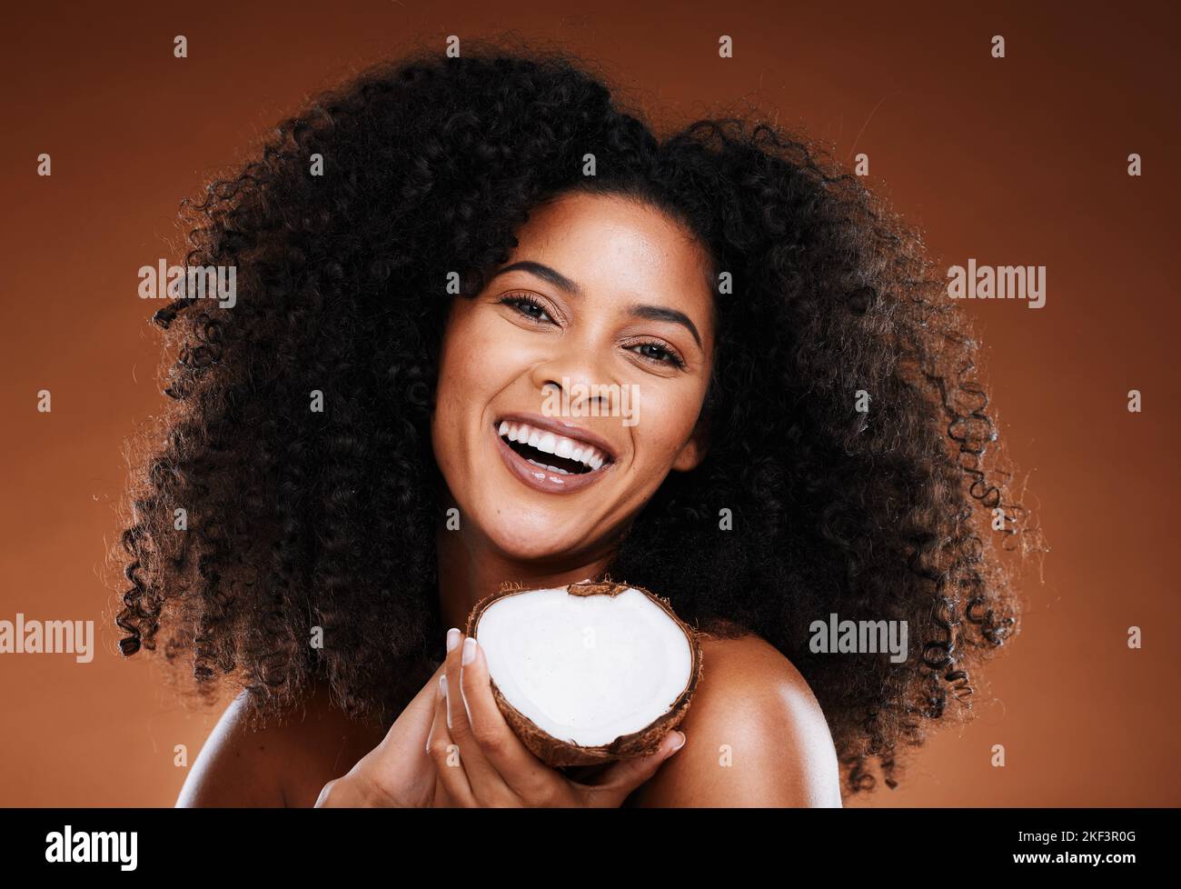 Black woman, coconut and beauty cosmetics makeup or natural skincare wellness. Luxury skin ...