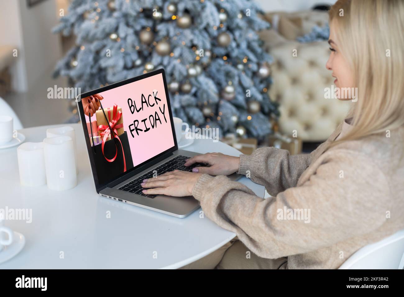 Black Friday shopping concept written in laptop's black screen against ...