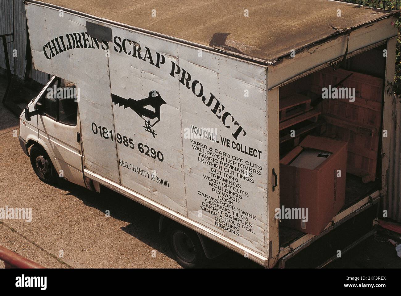A van collecting recyclable materials Stock Photo - Alamy