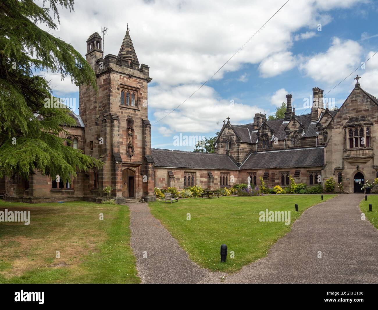 The church of St John the Baptist and former almshouses and hospital ...