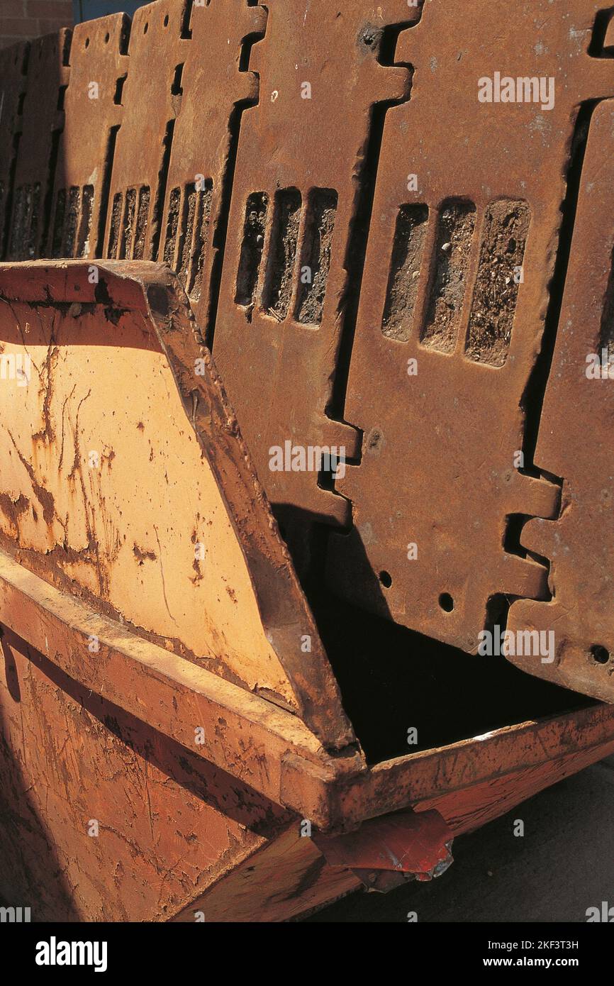Scrap metal in a skip container Stock Photo - Alamy