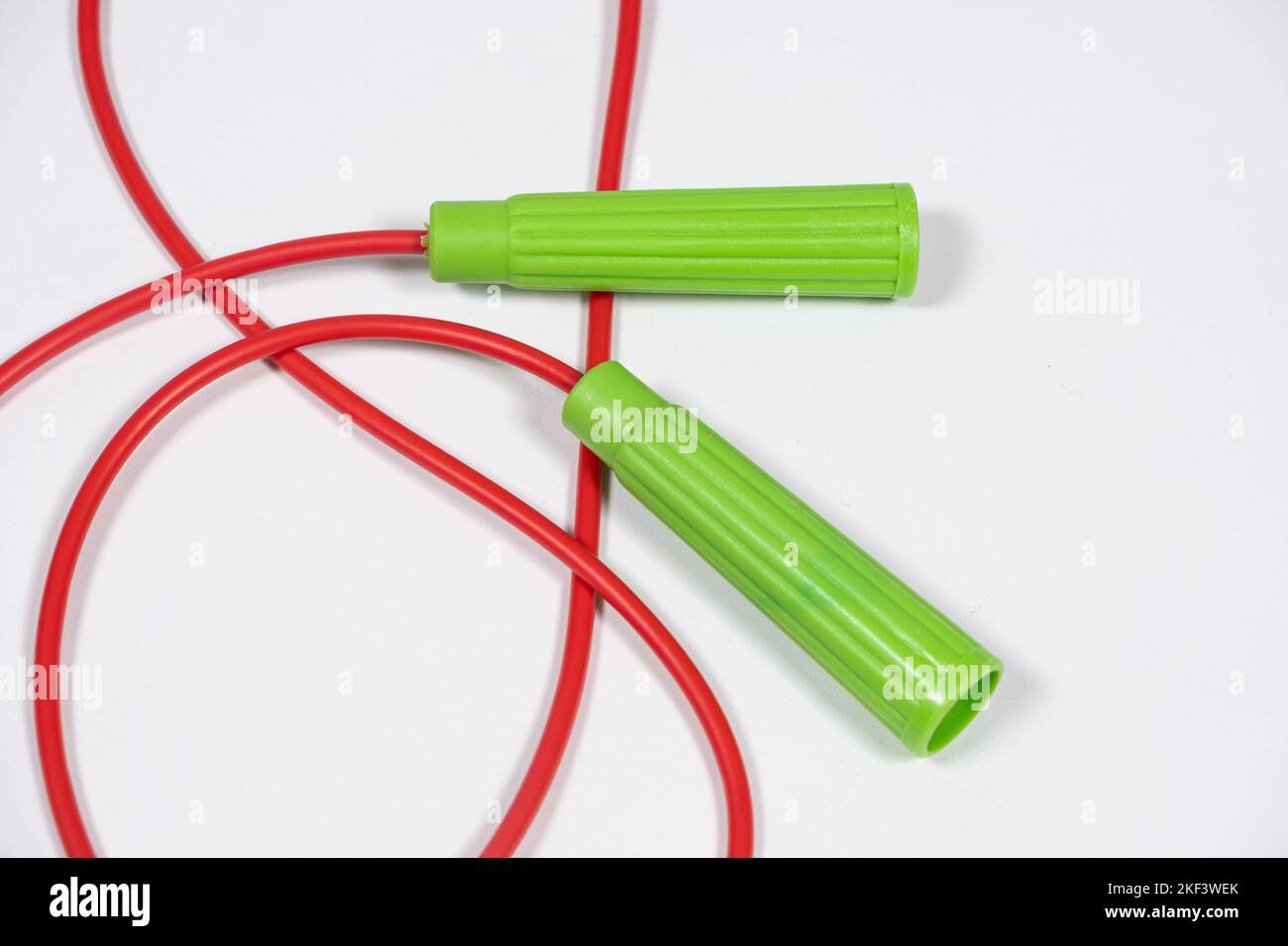 Red green rope on white background close-up Stock Photo - Alamy