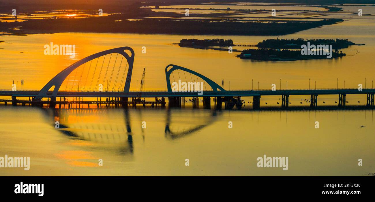 Aerial photo show the sunrise views of the Baima Lake Bridge in Huai'an ...