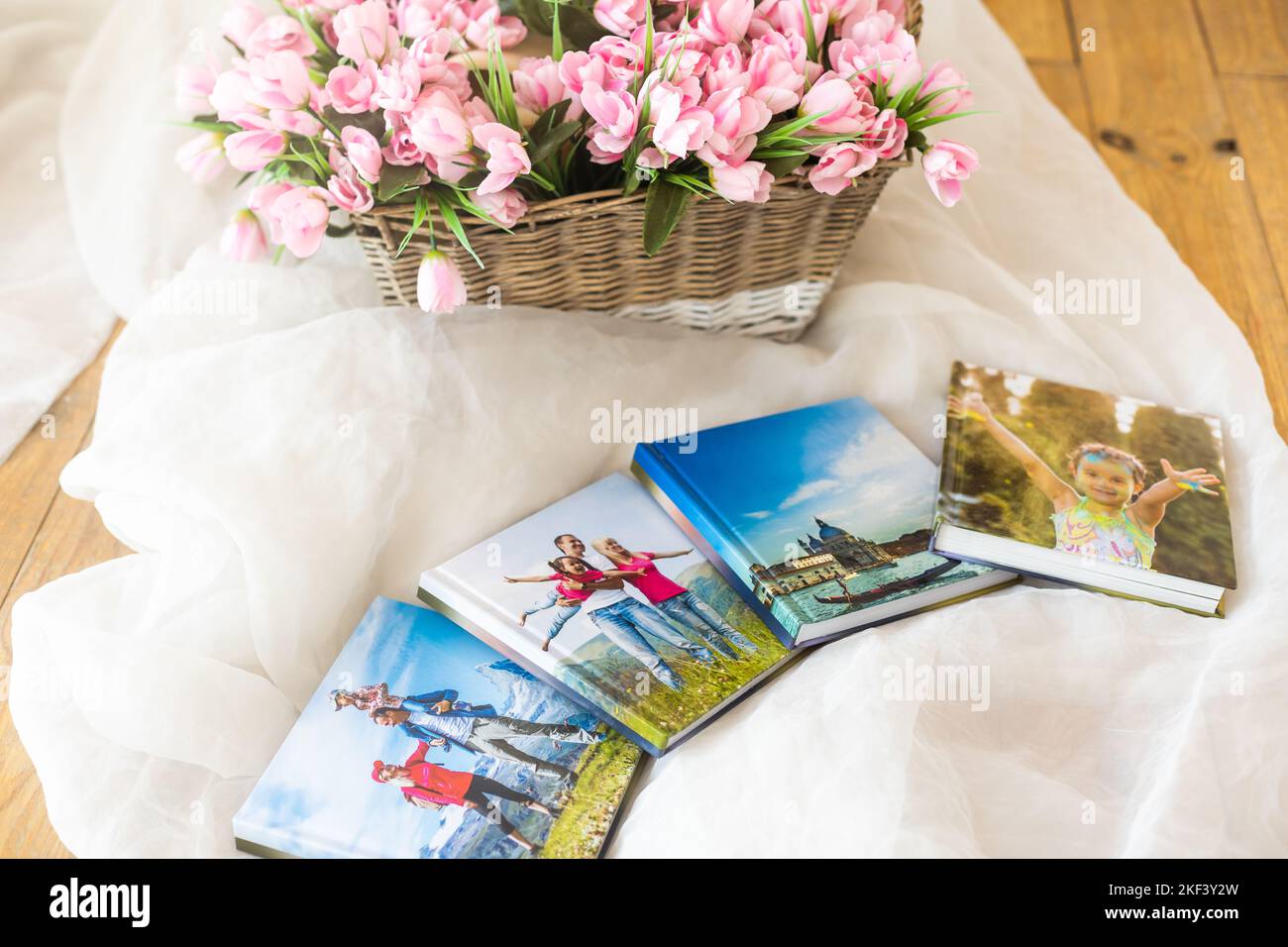 Photoalbum with pink flowers, photobooks Stock Photo - Alamy