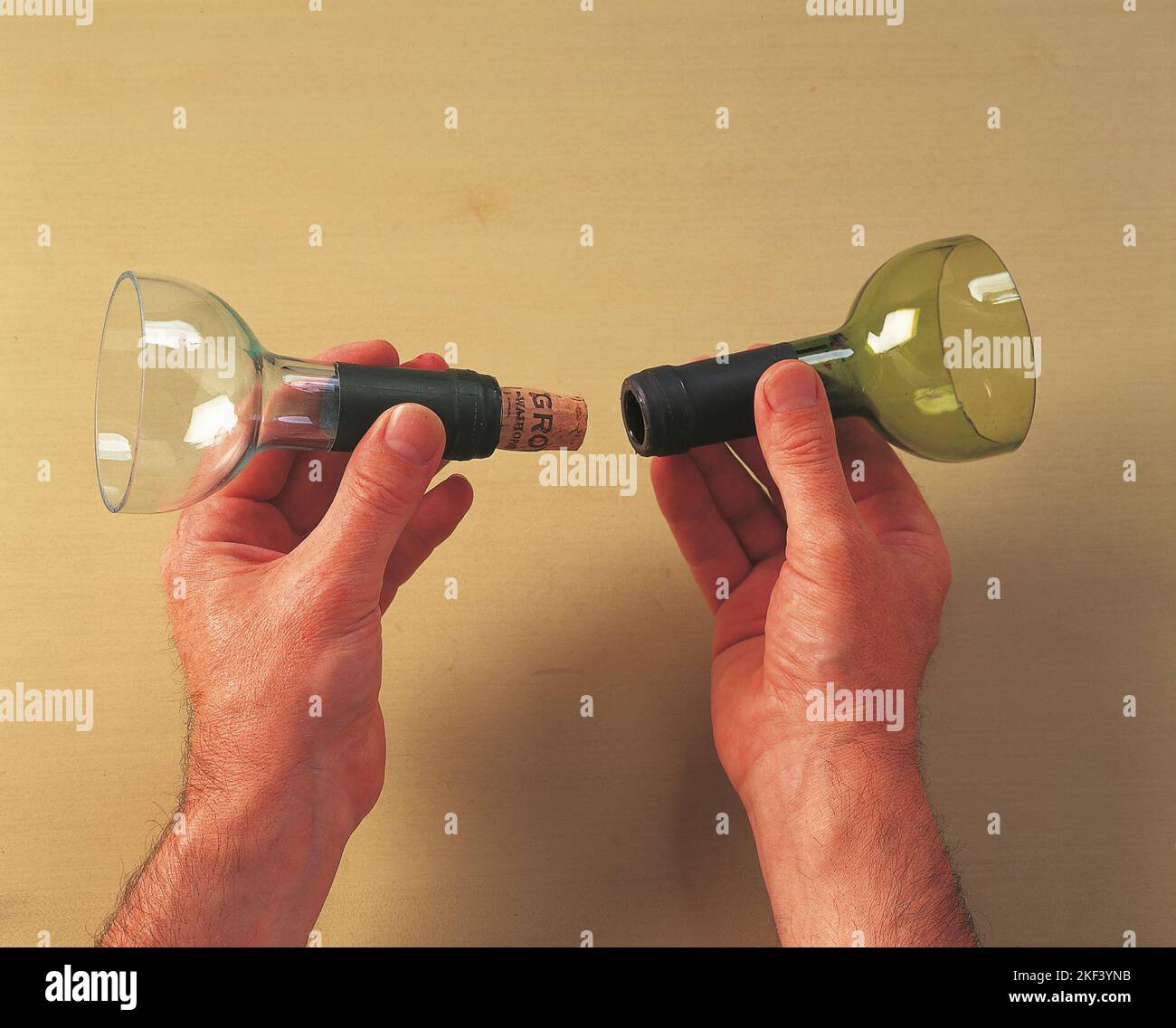 Joining two bottle tops together Stock Photo - Alamy