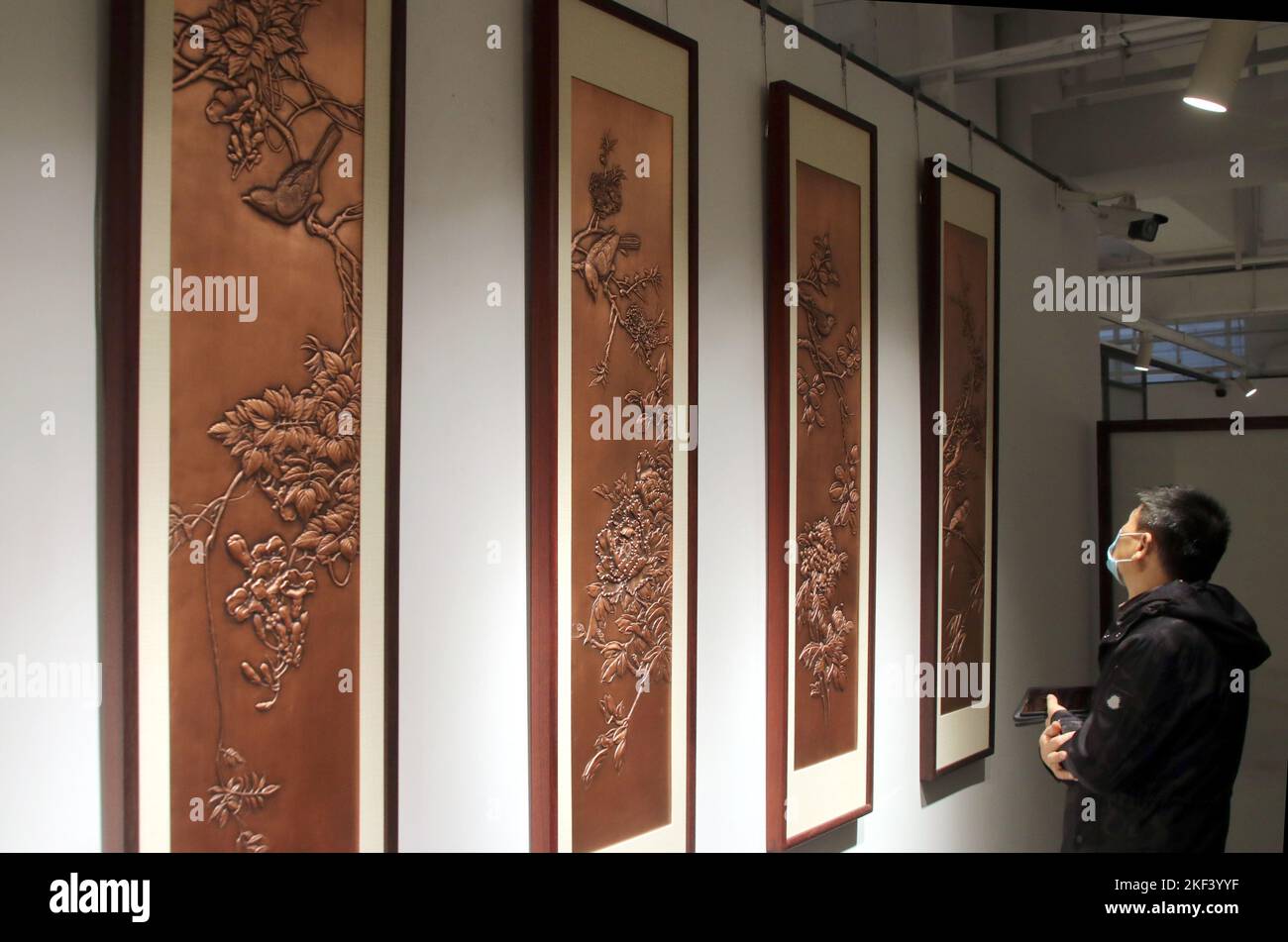 People are visiting the Metal Carving Exhibition at Suzhou Artisan ...