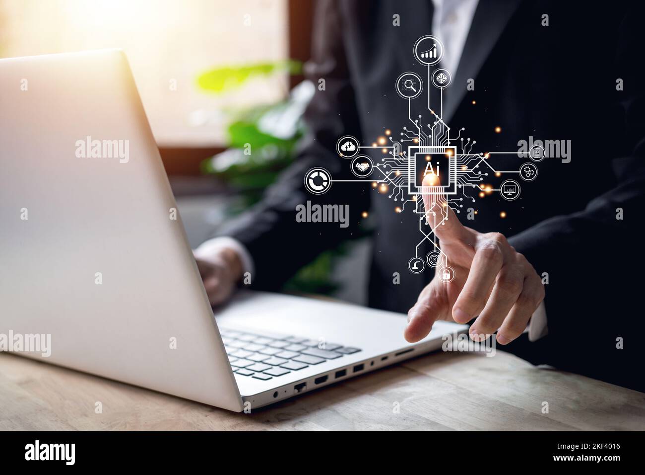 AI (Artificial intelligence) growing concept. Businessman hand typing ...