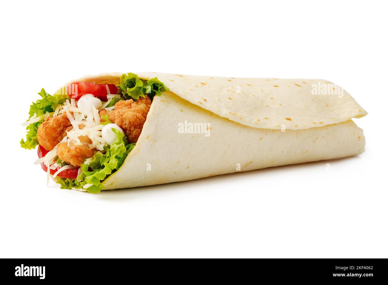 Tortilla wrap with fried chicken meat and vegetables isolated on white ...